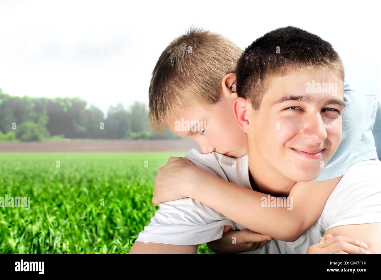 Cute happy teen brothers laughing hi-res stock photography and images ...