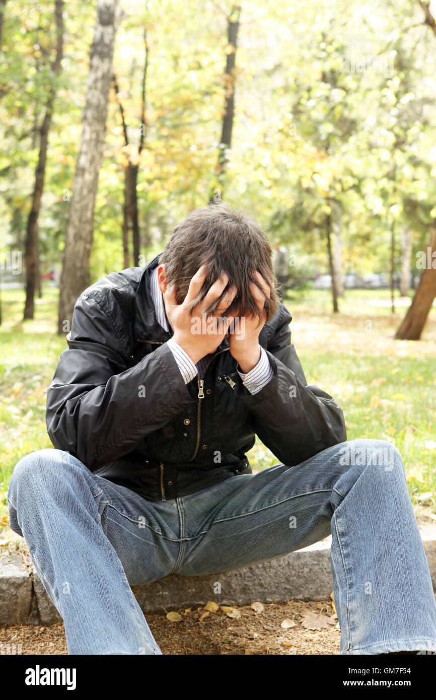 sad young man Stock Photo - Alamy