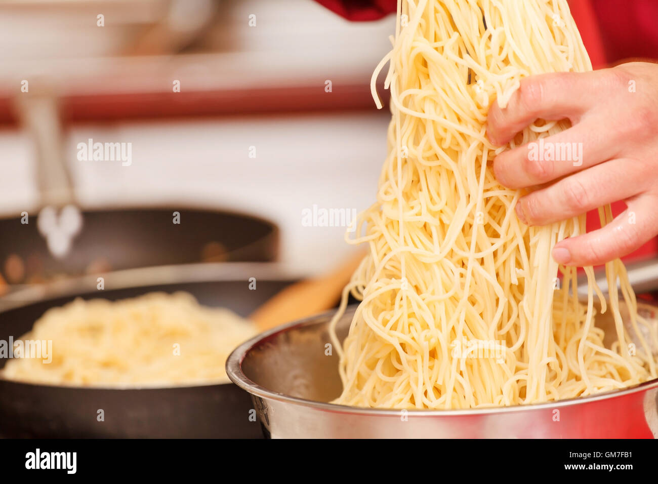 Chef preparing pasta Stock Photo - Alamy