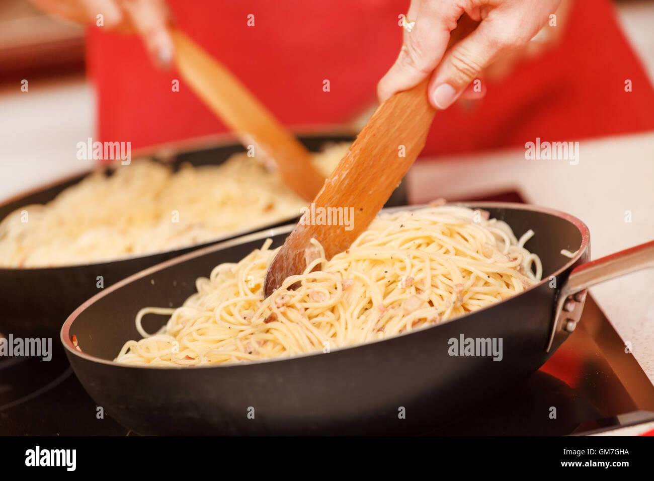 Chef preparing pasta Stock Photo - Alamy