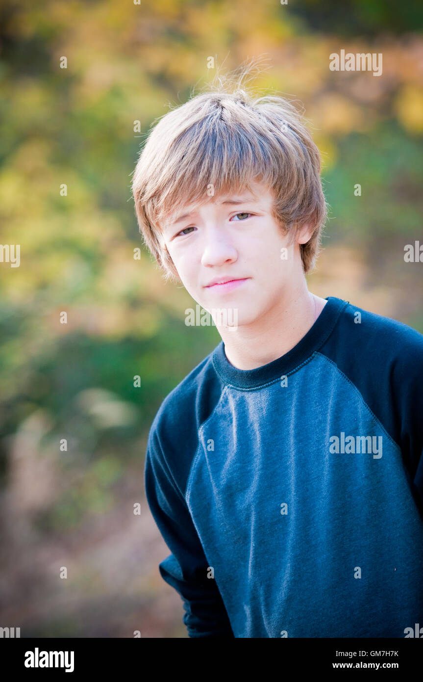 Portrait of young teen looking at camera Stock Photo - Alamy
