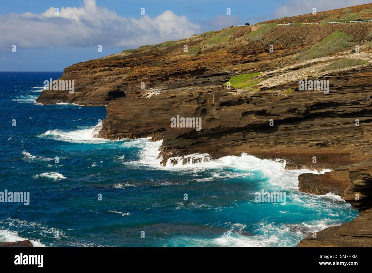 Oahu Cliffs with beautiful bright, blue, foamy waves Stock Photo - Alamy