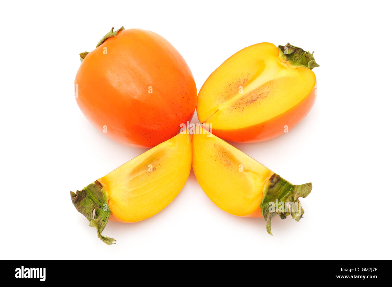 Persimmon group on red Cut Out Stock Images & Pictures - Alamy