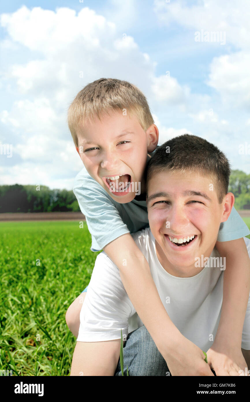 Cute Happy Teen Brothers Laughing High Resolution Stock Photography and ...