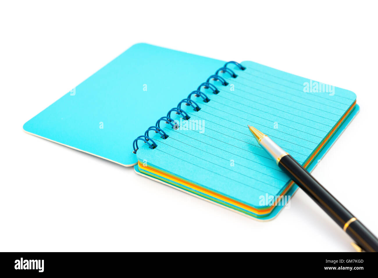 pen and colorful notebook on white Stock Photo - Alamy