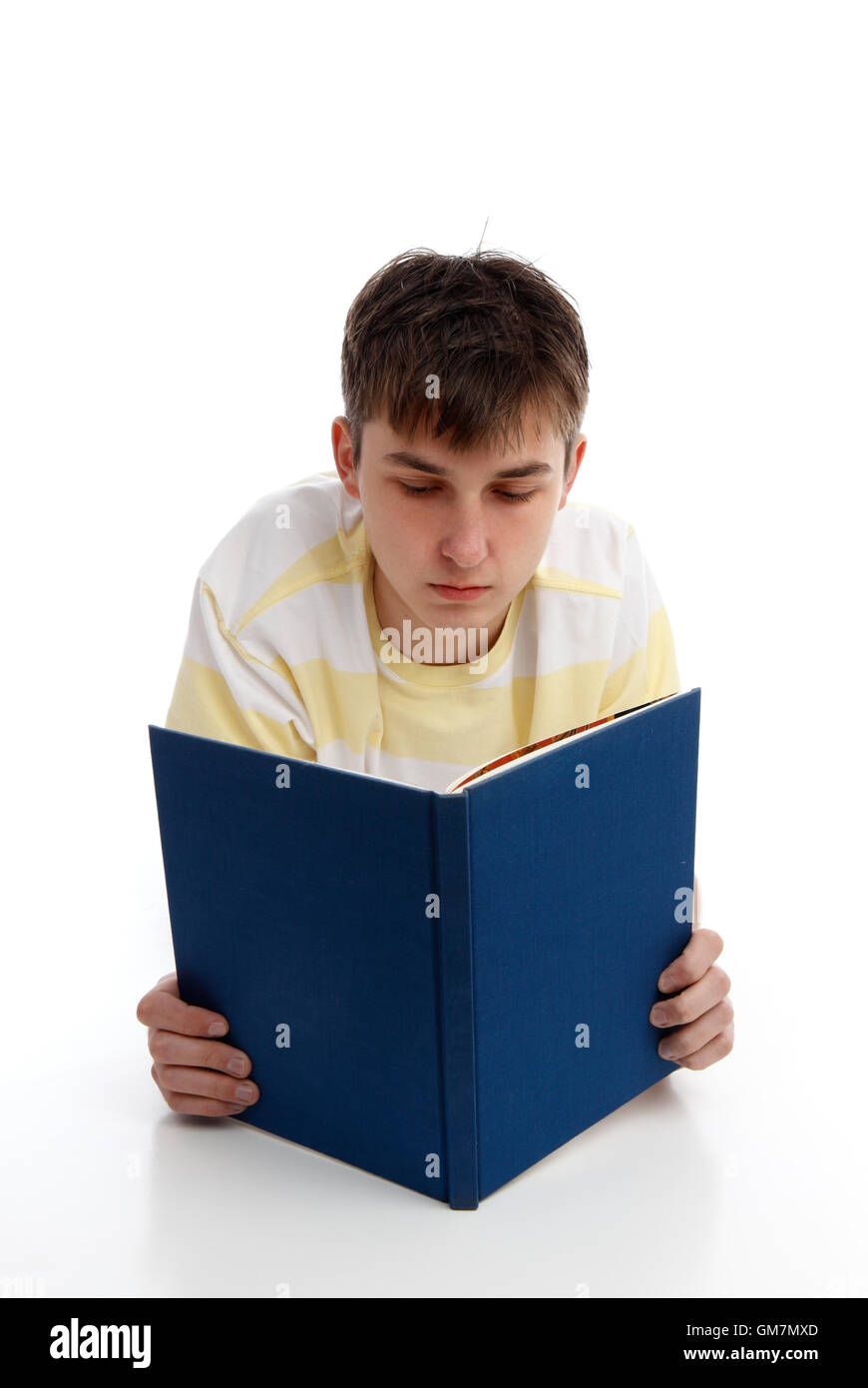 Boy reading learning studying Stock Photo - Alamy