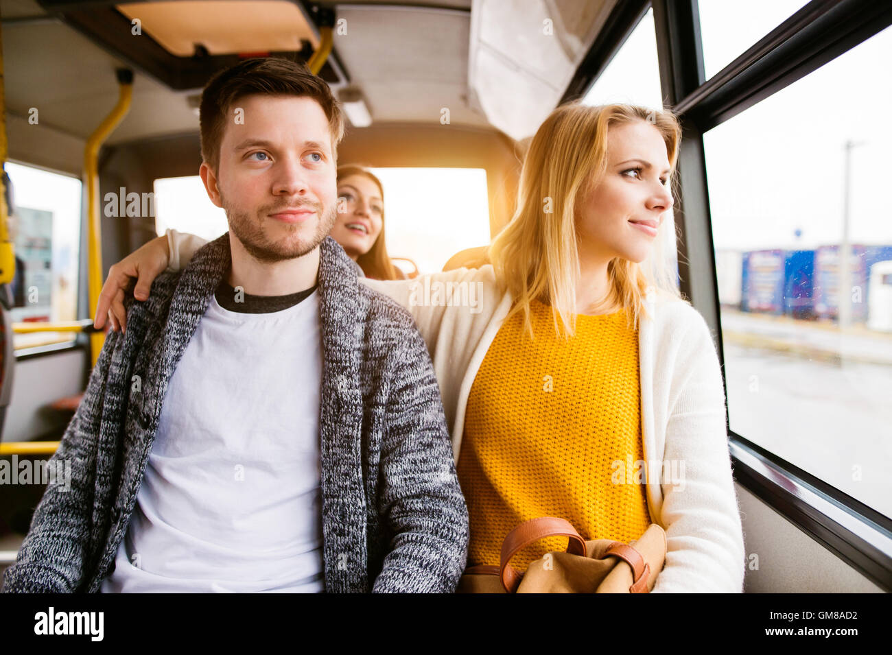 Man looking at woman bus hi-res stock photography and images - Alamy