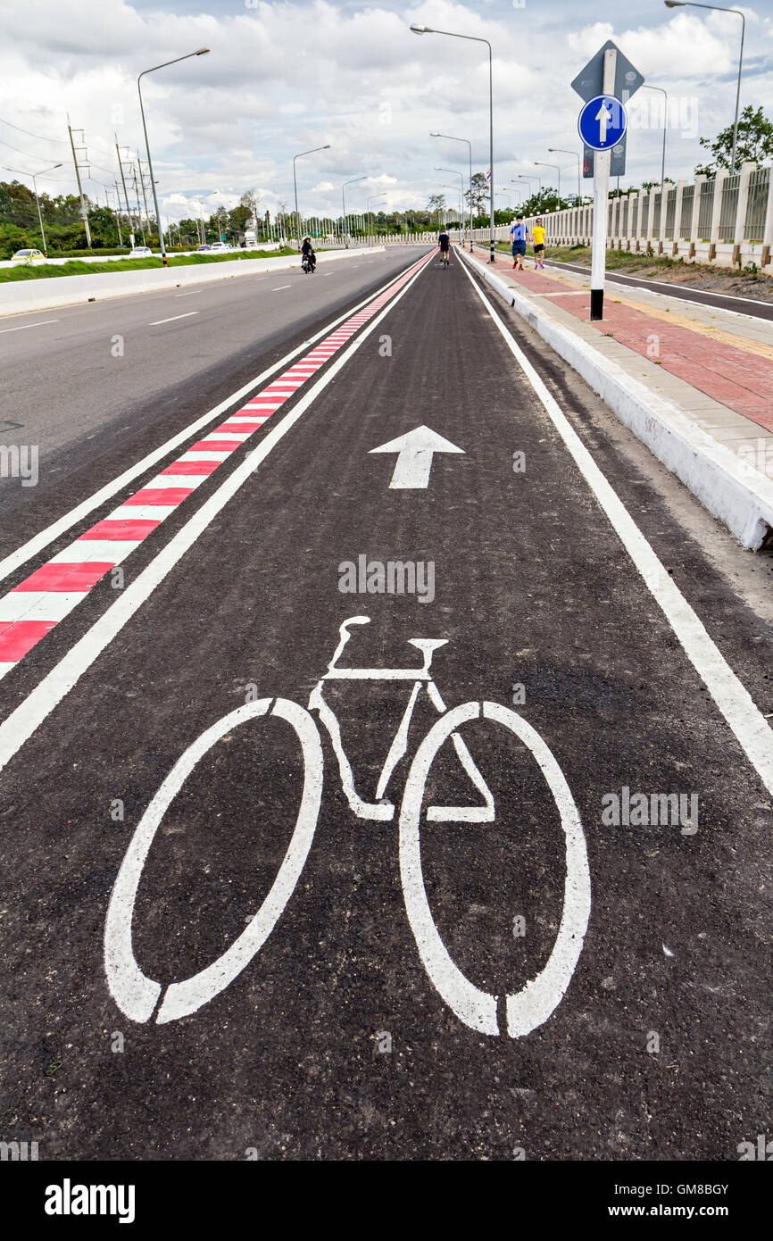 Bicycle Lane Symbol On Road High Resolution Stock Photography and ...