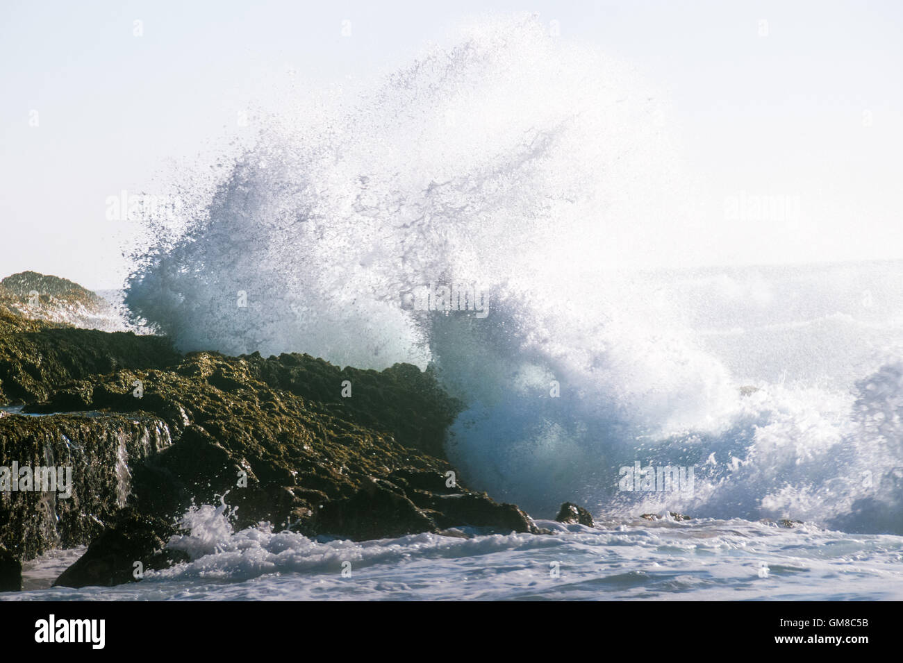 Splashing against rock hi-res stock photography and images - Alamy