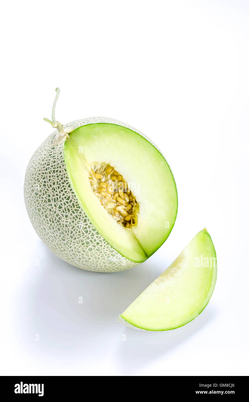 shopped green melon isolated on white background Stock Photo - Alamy