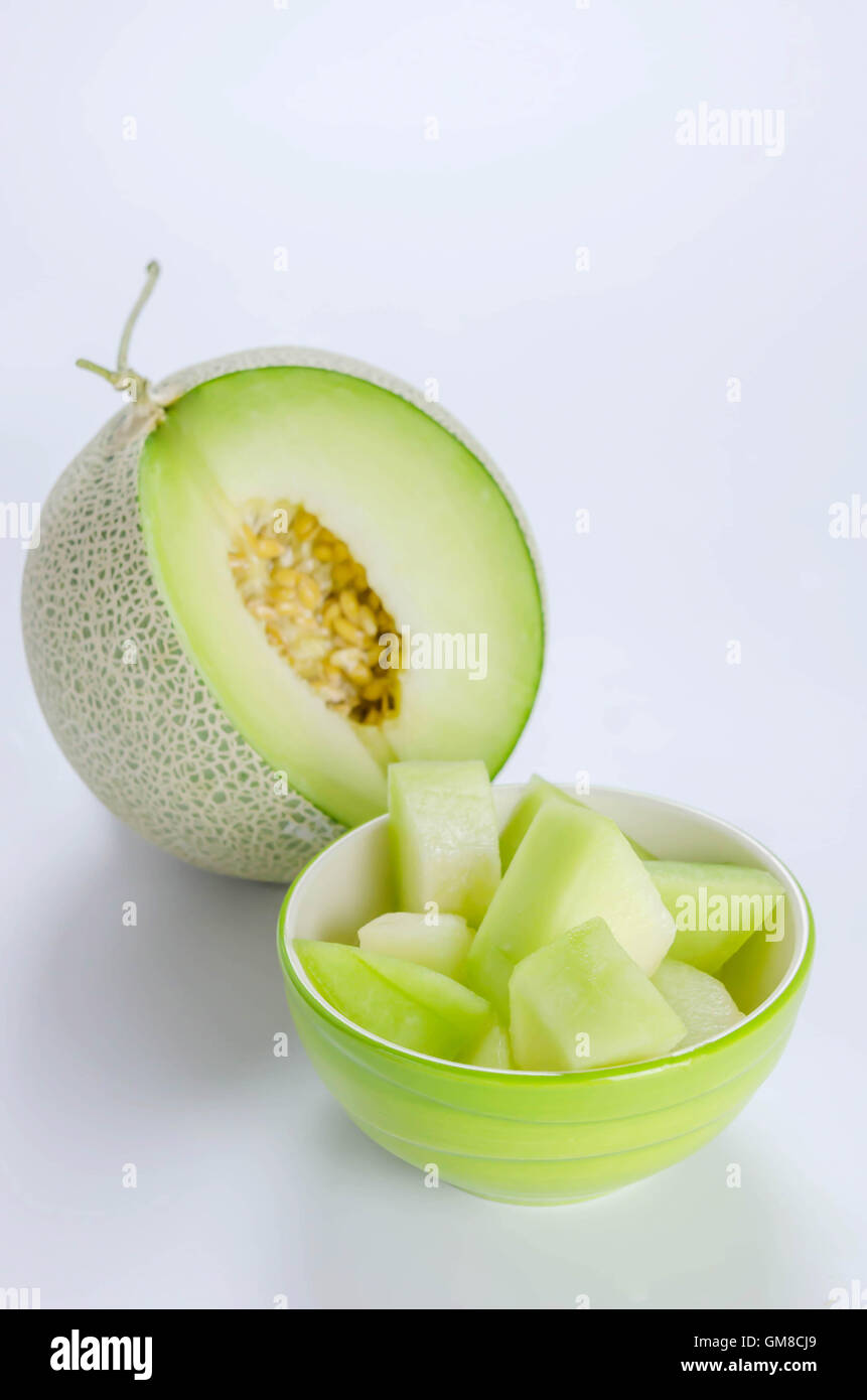 shopped green melon isolated on white background Stock Photo - Alamy