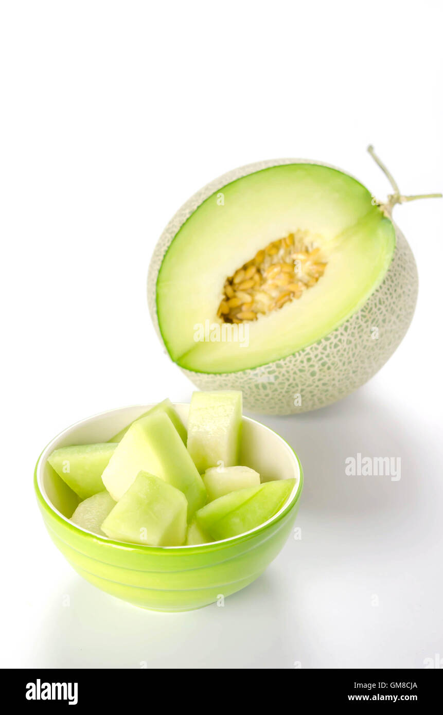 shopped green melon isolated on white background Stock Photo - Alamy