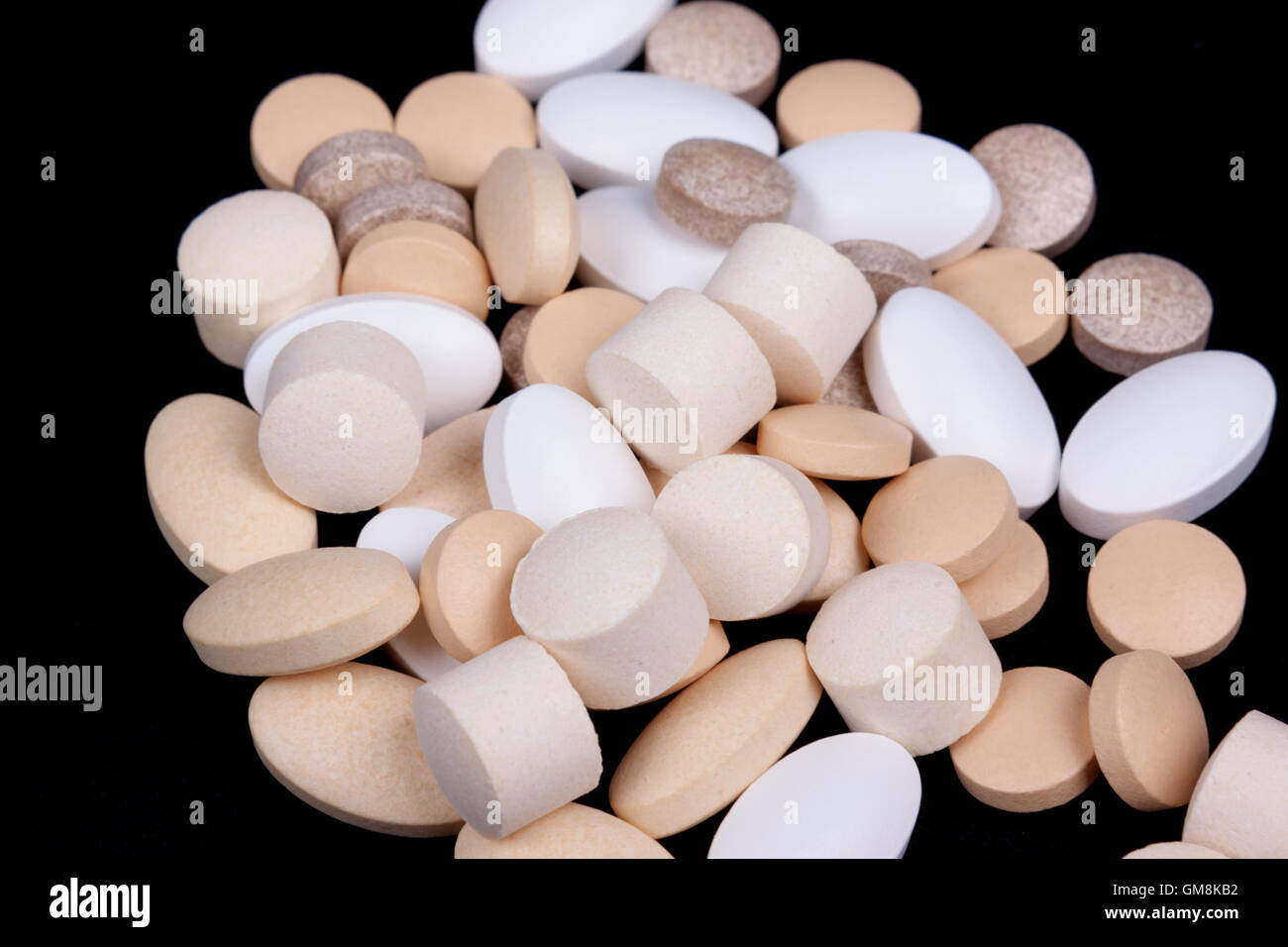 Different coloured and different shaped pils Stock Photo - Alamy