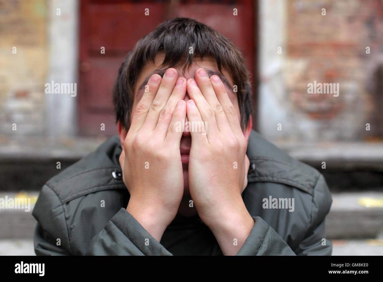 man with hidden face Stock Photo - Alamy