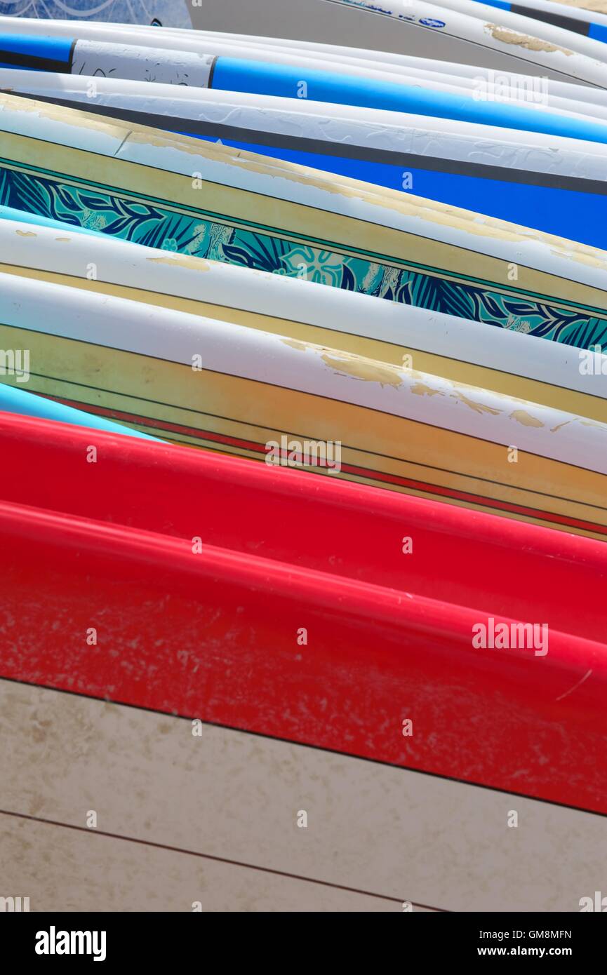 A Row of Brightly Colored Surfboards Stock Photo - Alamy