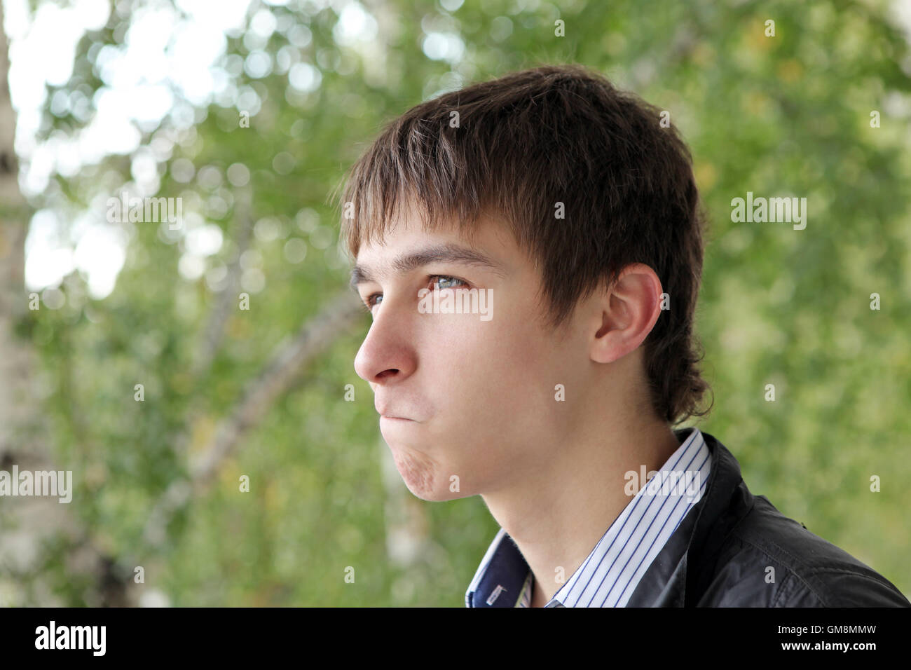 irresolute young man Stock Photo - Alamy