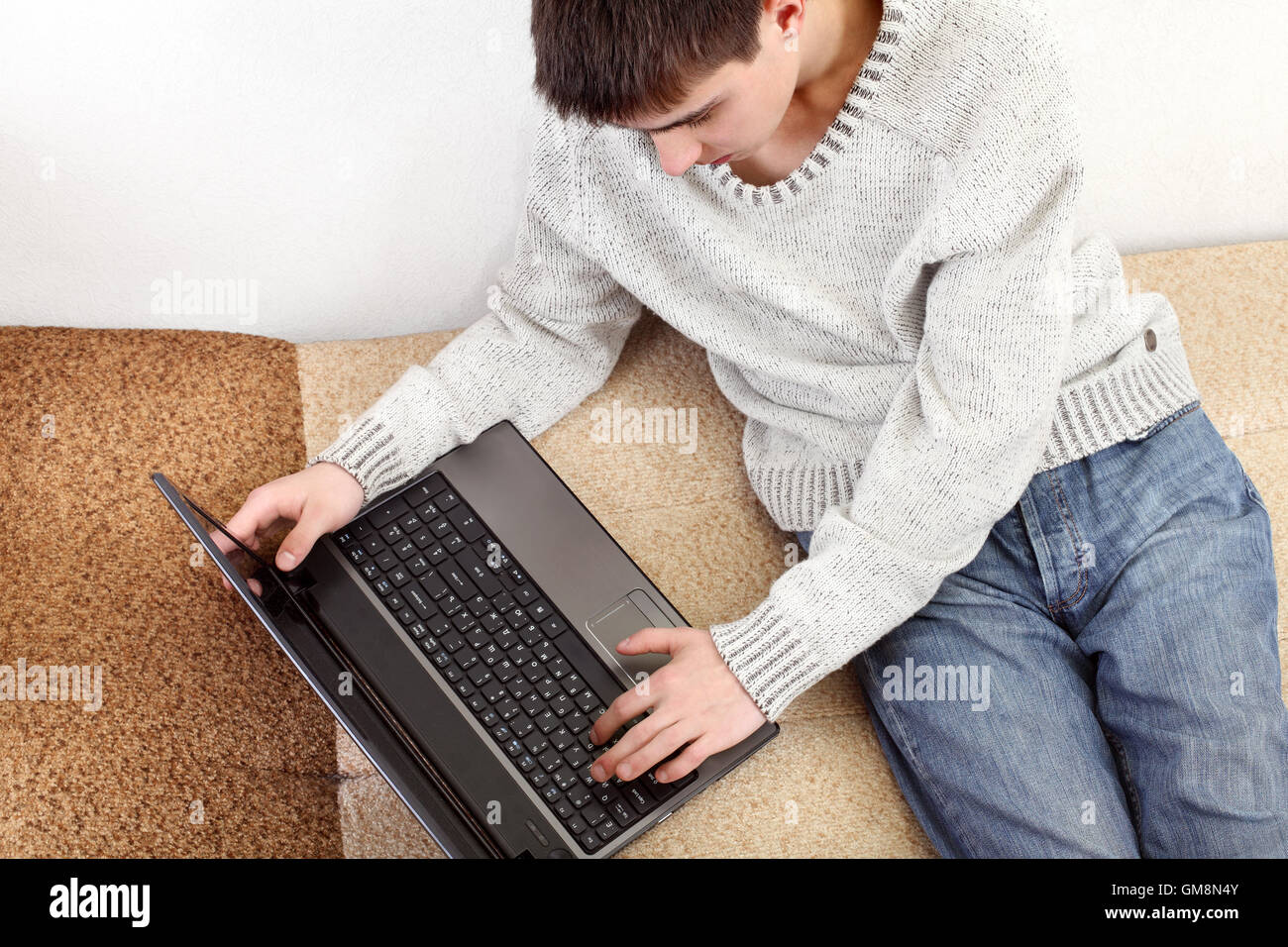 young man with notebook Stock Photo - Alamy