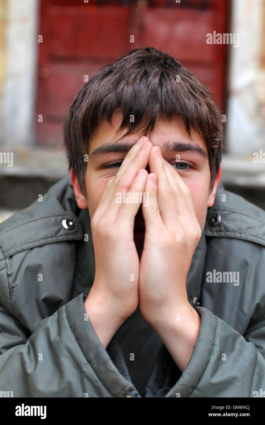 sad young man Stock Photo - Alamy