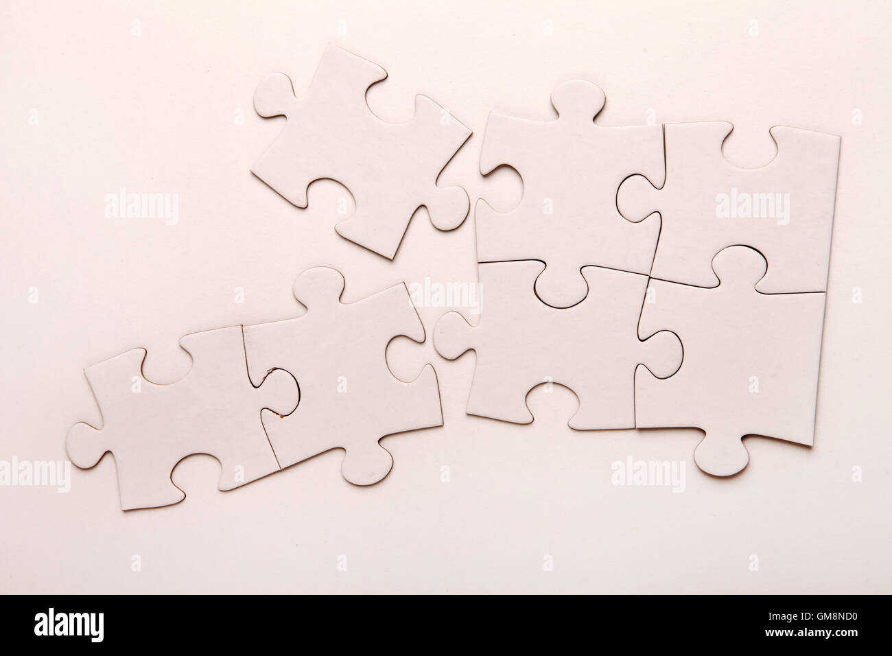 White jigsaw puzzle Stock Photo - Alamy