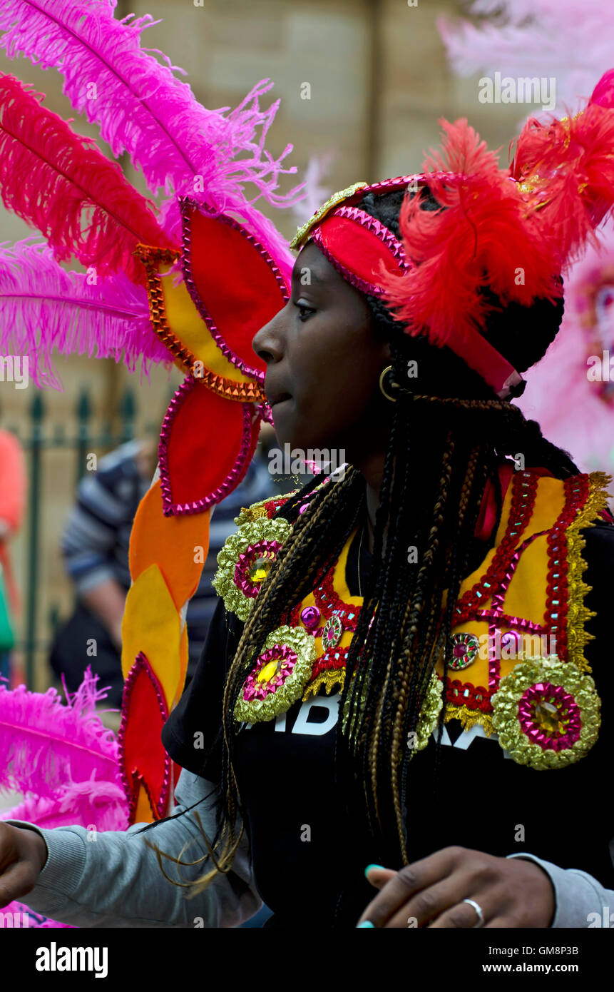 Black African girl in a colourful costume taking part in the Cavalcade ...