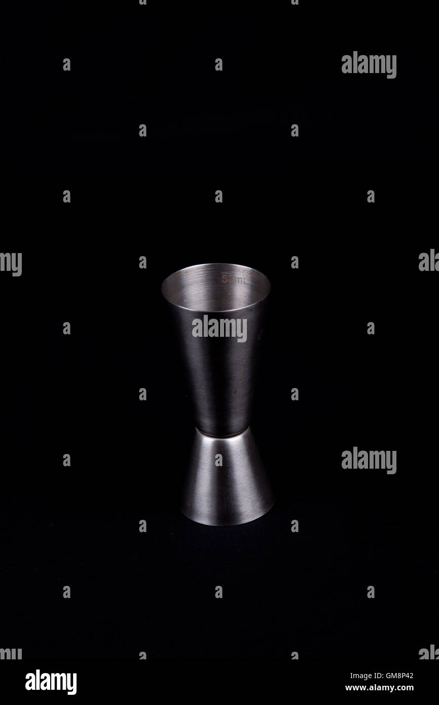 jigger on black background Stock Photo - Alamy