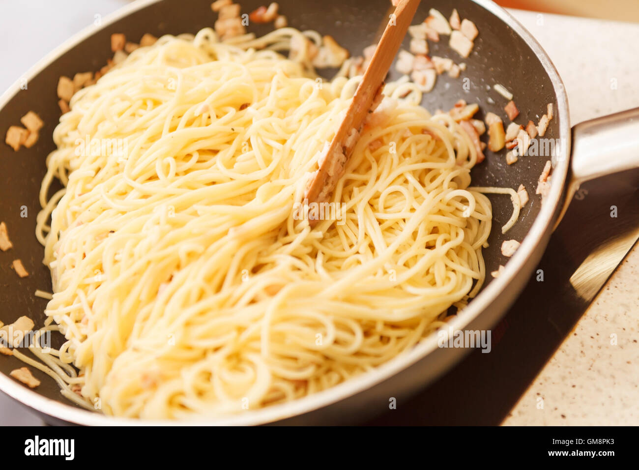 Chef preparing pasta Stock Photo - Alamy