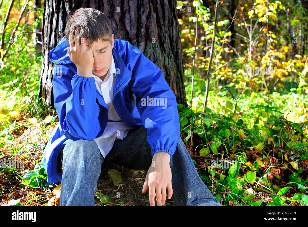 sorrowful young man Stock Photo - Alamy