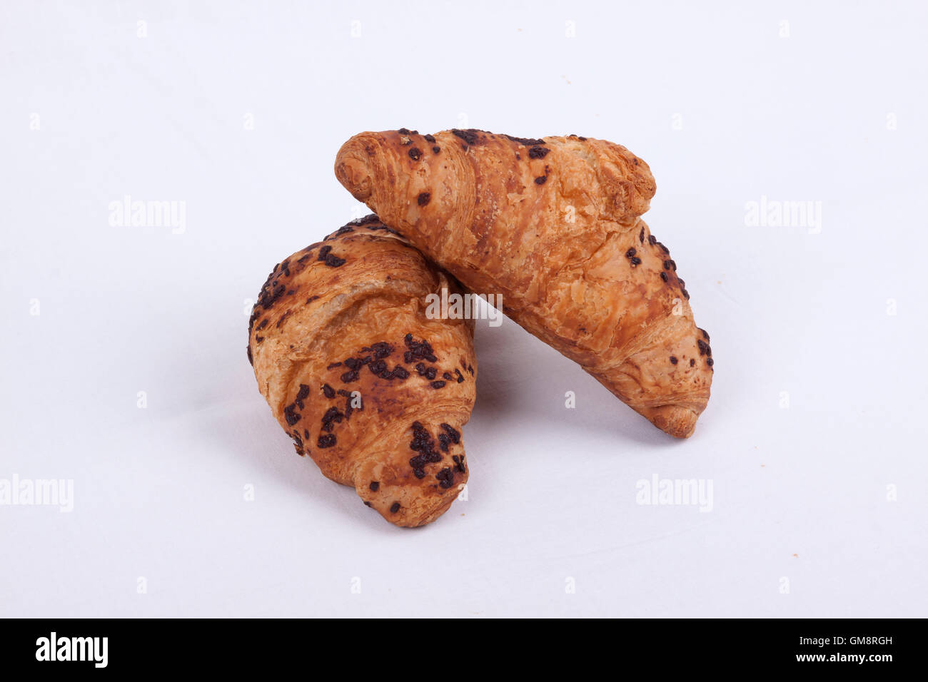 fresh chocolate croissant on a white background Stock Photo - Alamy