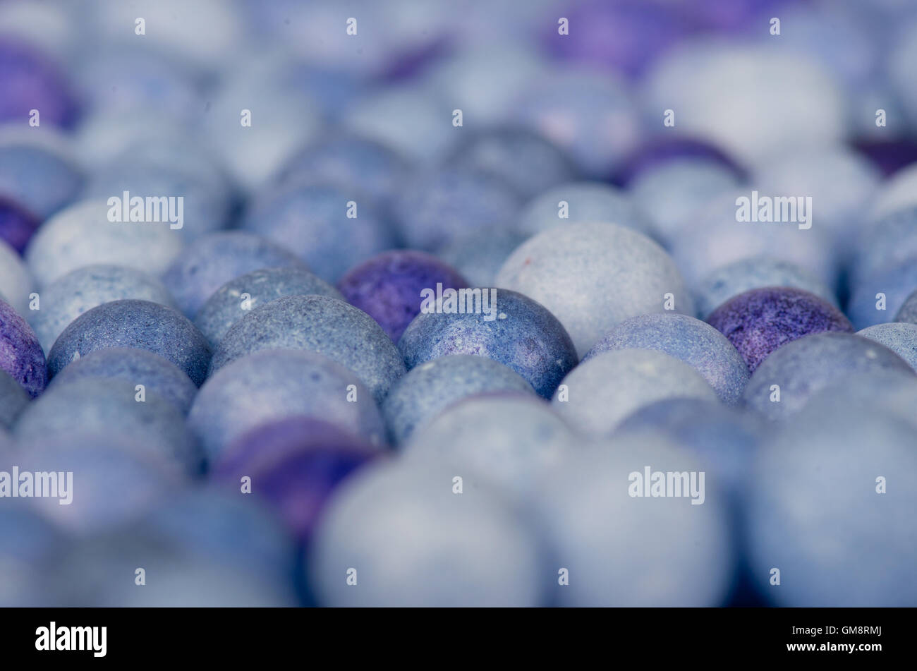Color beads focused at center Stock Photo - Alamy