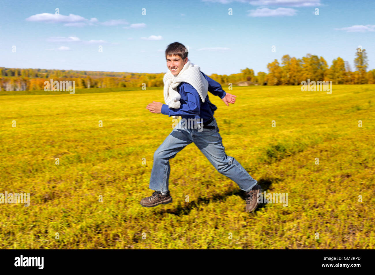 happy teenager running Stock Photo - Alamy