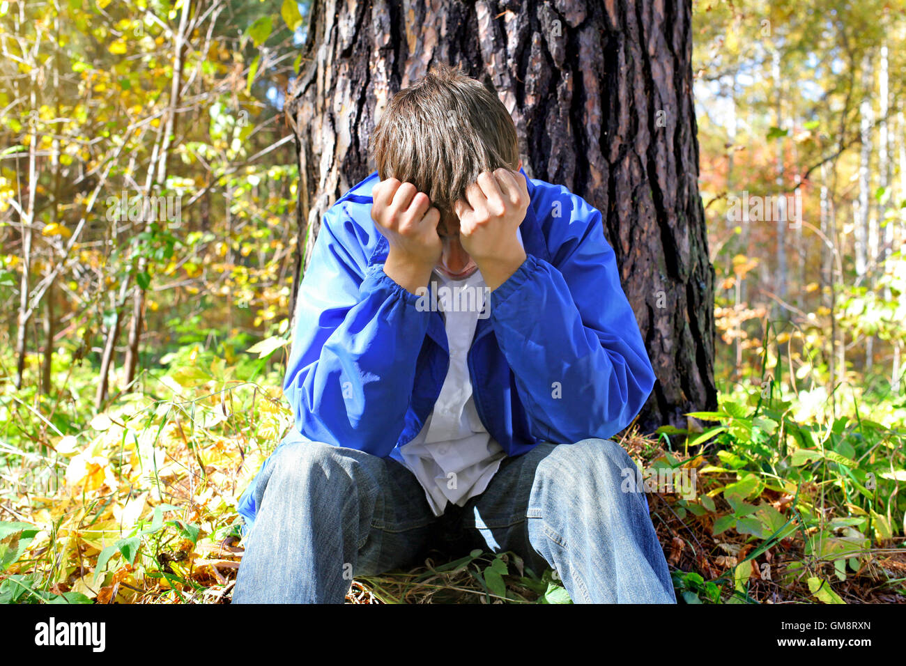 sorrowful young man Stock Photo - Alamy