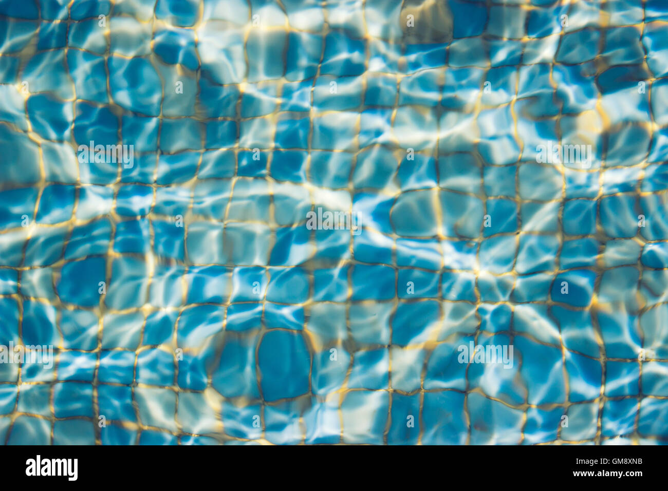 Blue water in the pool - reflection background Stock Photo - Alamy