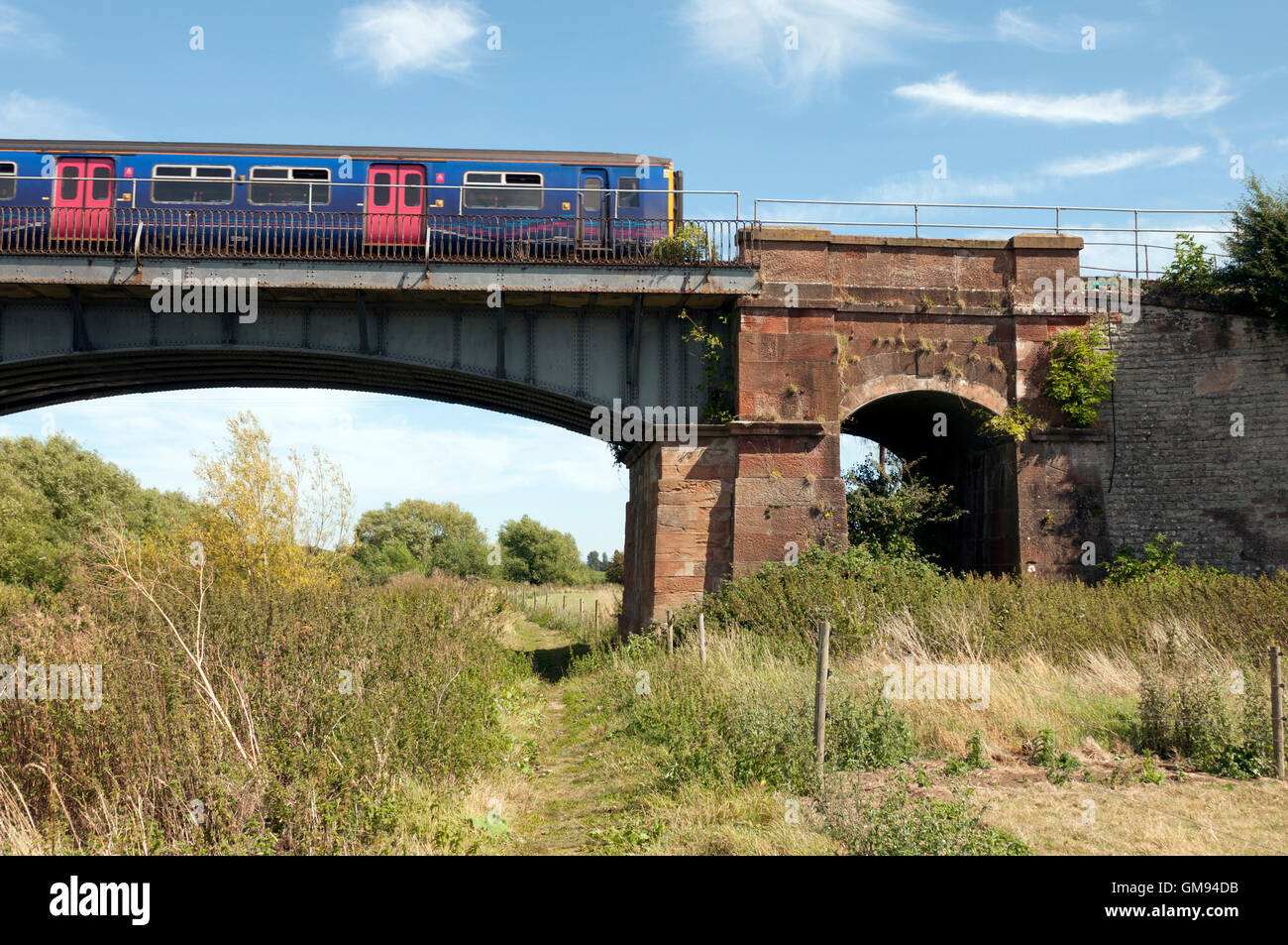 Great Western train crossing Shakespeare`s Avon Way footpath at ...