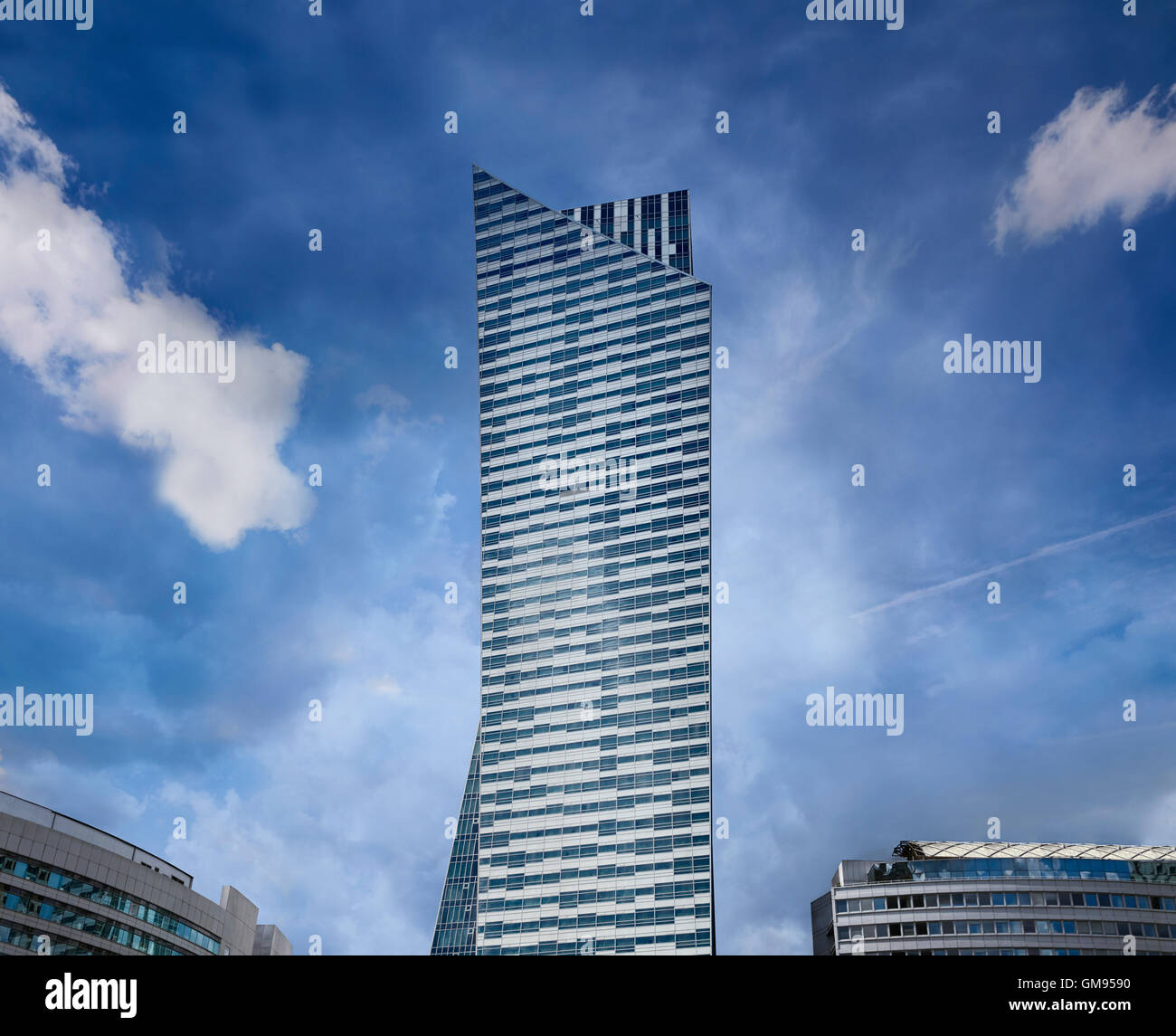 Modern residential skyscraper at dark blue sky. Copy space Stock Photo ...