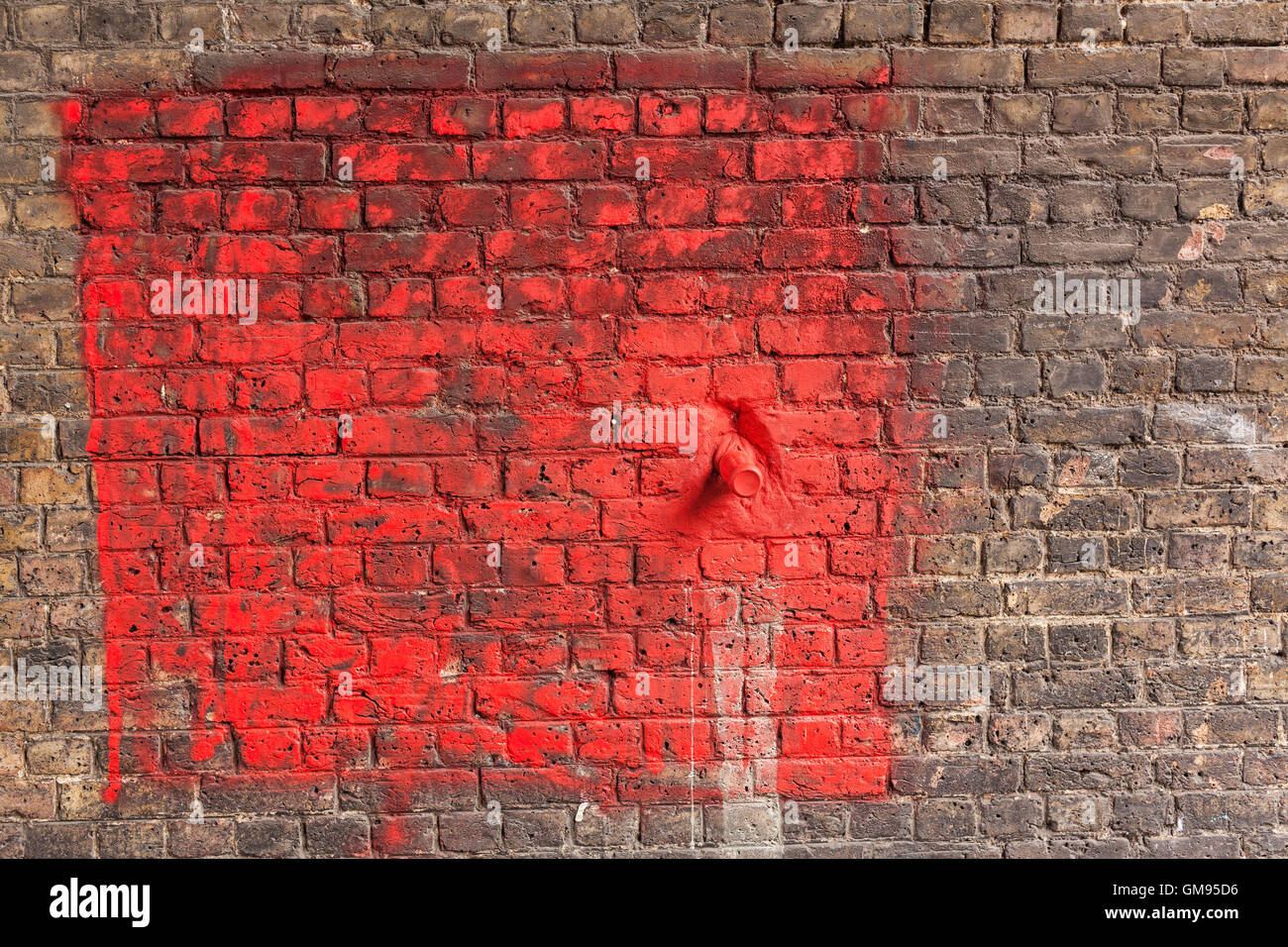 Red painted bricks pattern background of a wall Stock Photo - Alamy