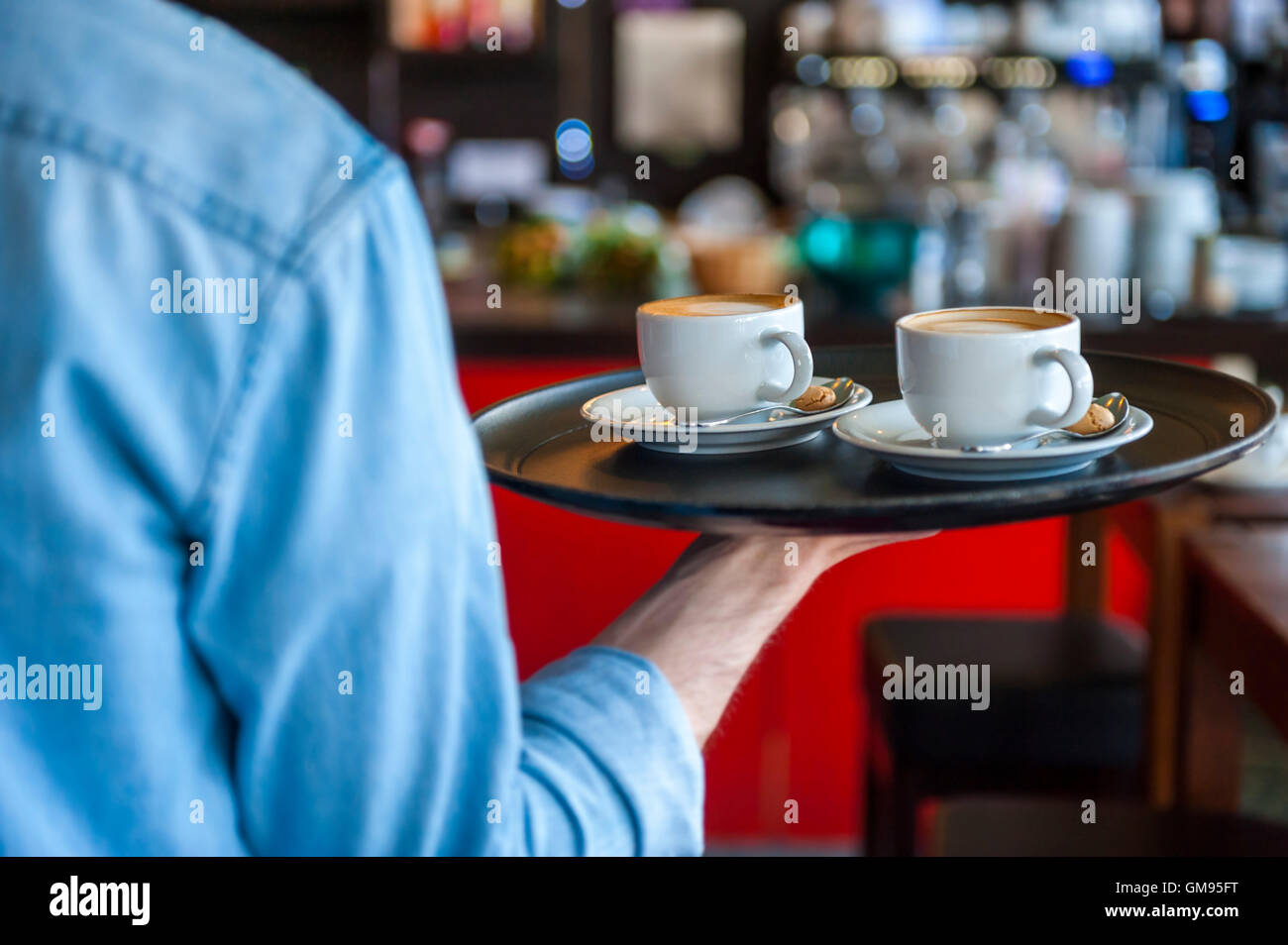Cafe waiter serving tray hi-res stock photography and images - Alamy