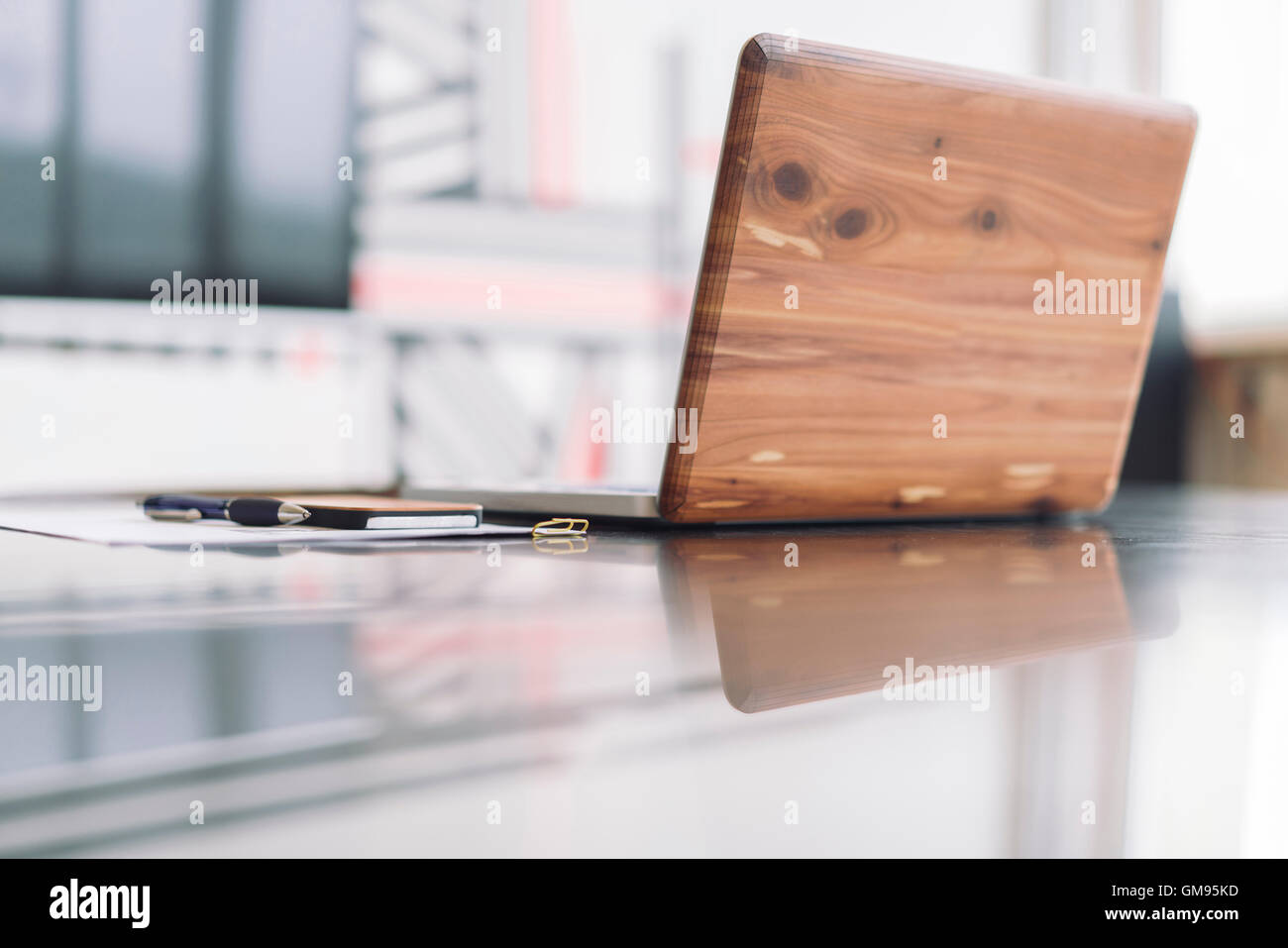 Wooden laptop on desk Stock Photo - Alamy