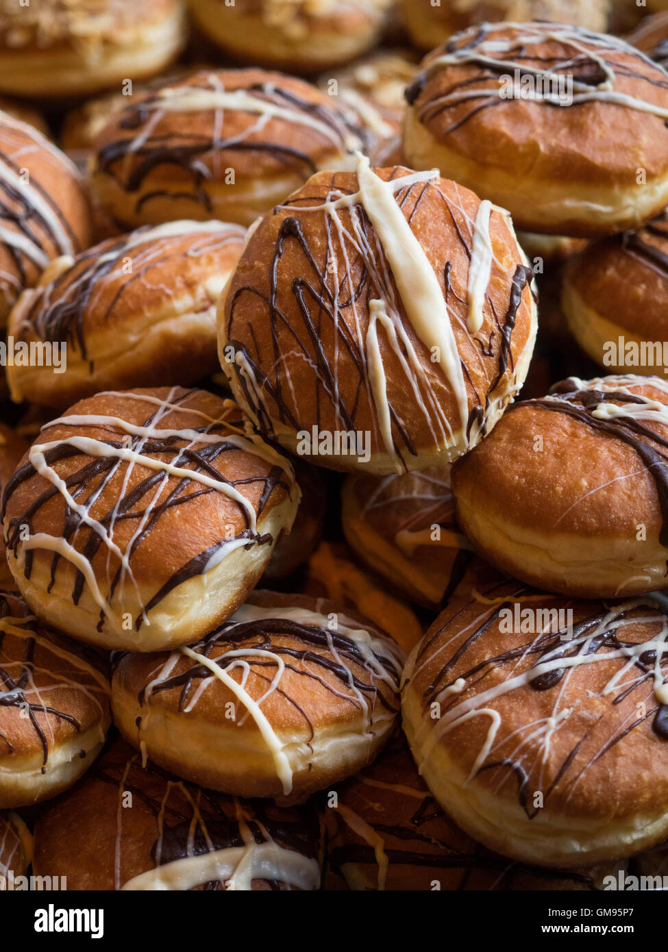 Freshly made sweet doughnuts on sale at the Borough market in London ...