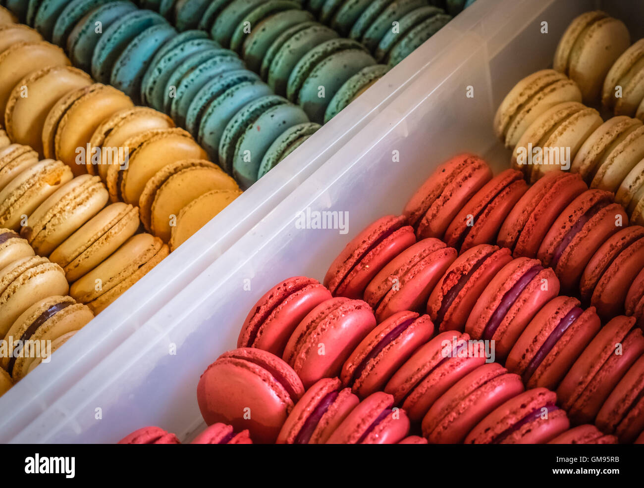 Colourful sweet macarons mini cakes for sale at the Borough Market in ...