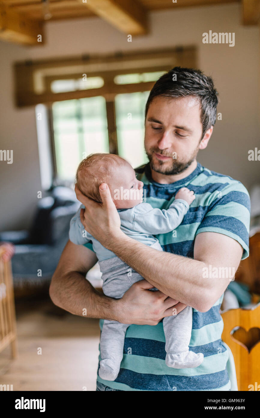 Father with baby boy at home Stock Photo - Alamy