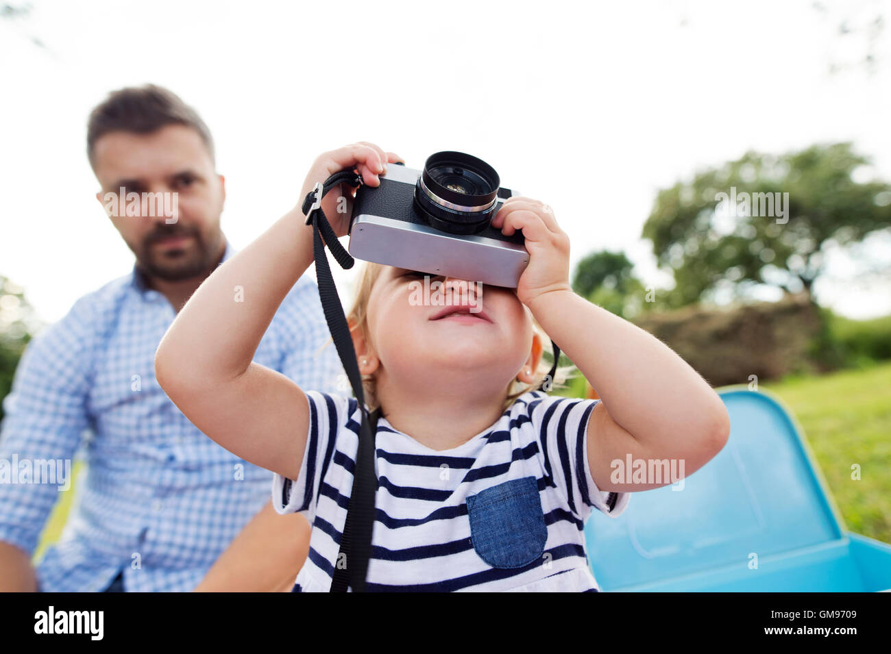 Little girl with camera Stock Photo - Alamy