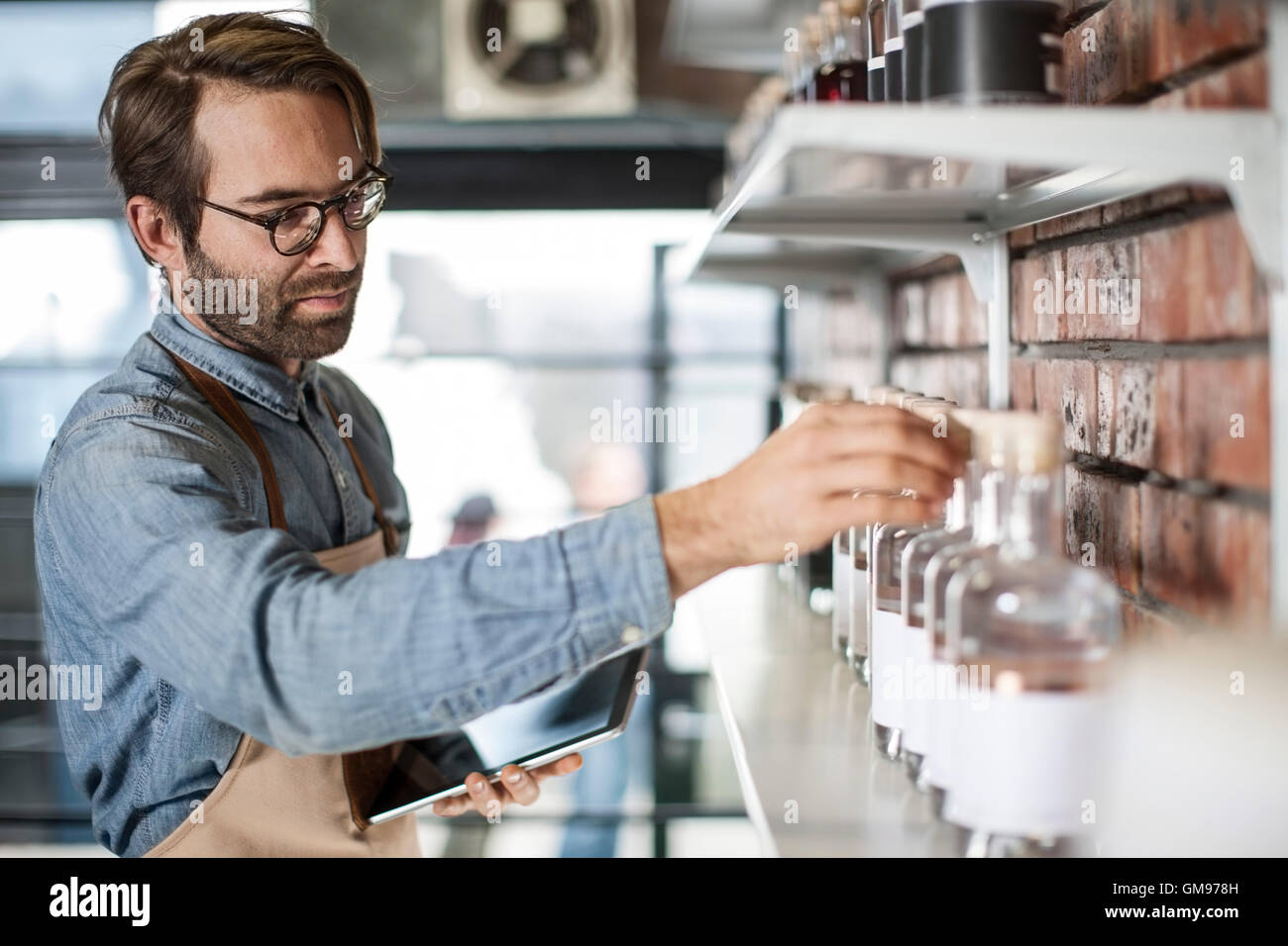 Person reaching shelf storage hi-res stock photography and images - Alamy