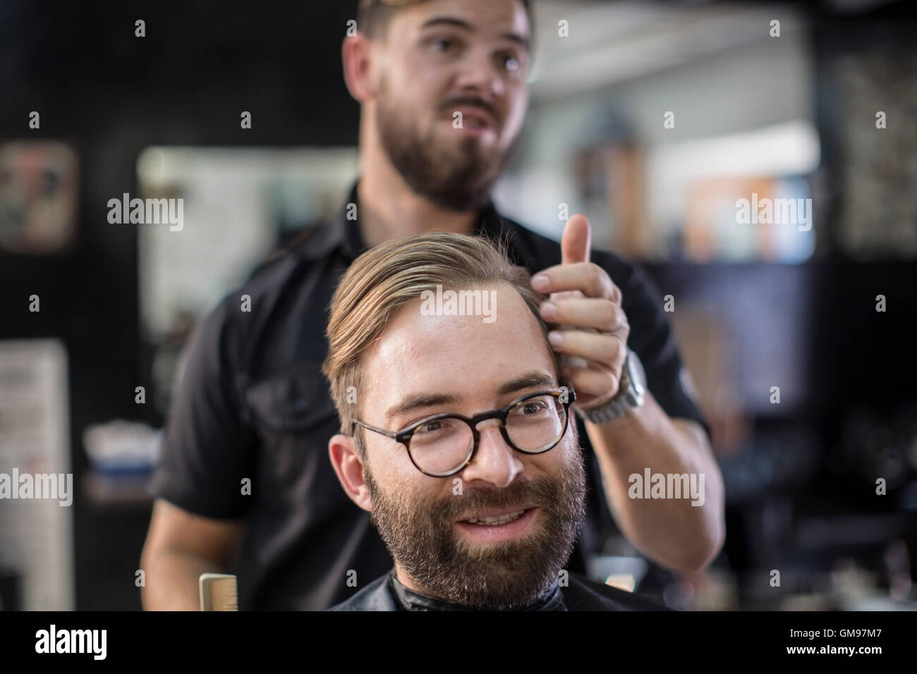 Barber and customer, smiling Stock Photo - Alamy
