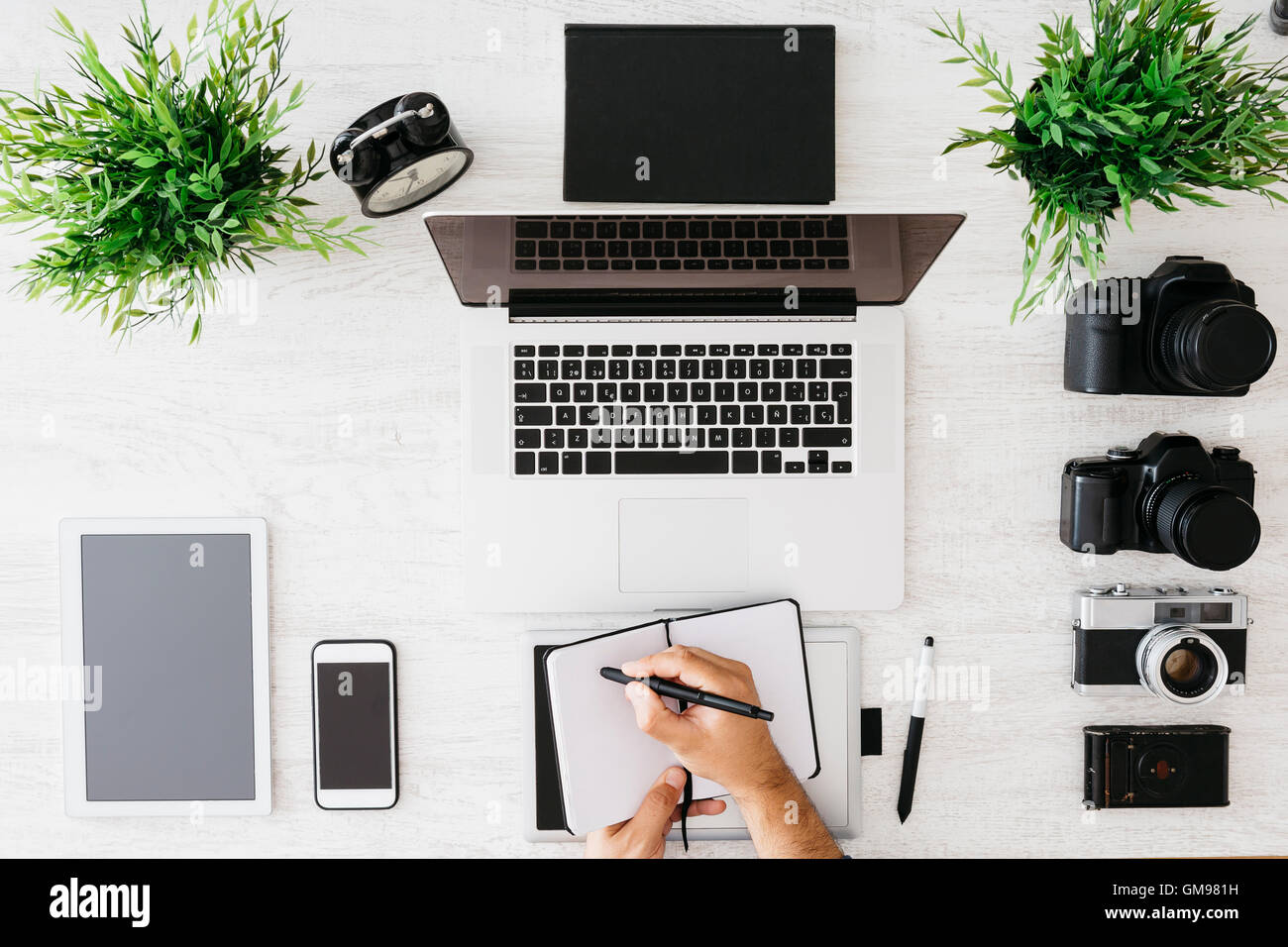 Photographer working at desk , top view Stock Photo - Alamy