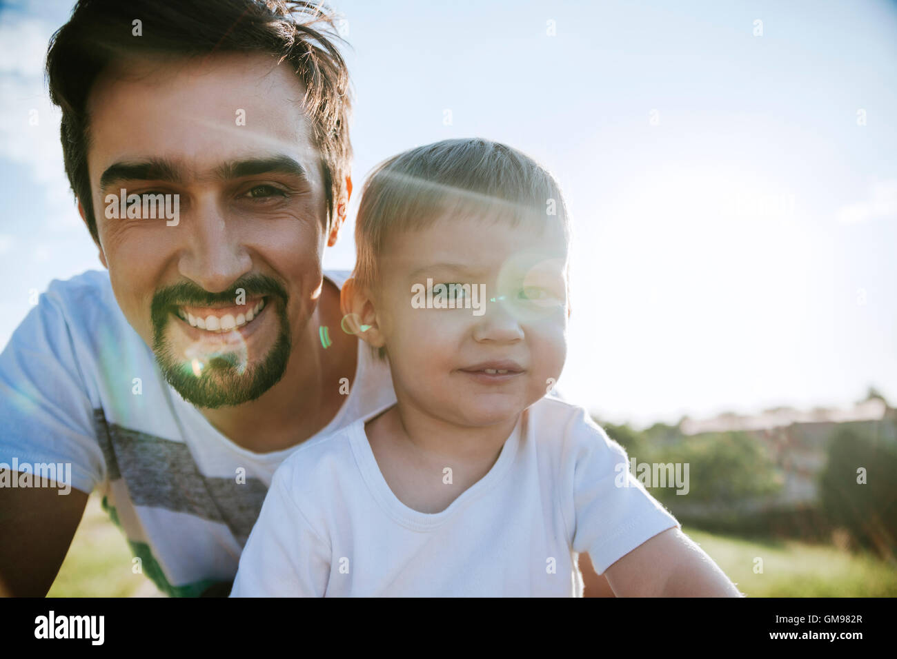 Portrait of father and little son Stock Photo - Alamy