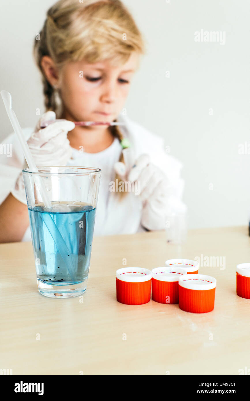 Child playing in chemical laboratory Stock Photo - Alamy
