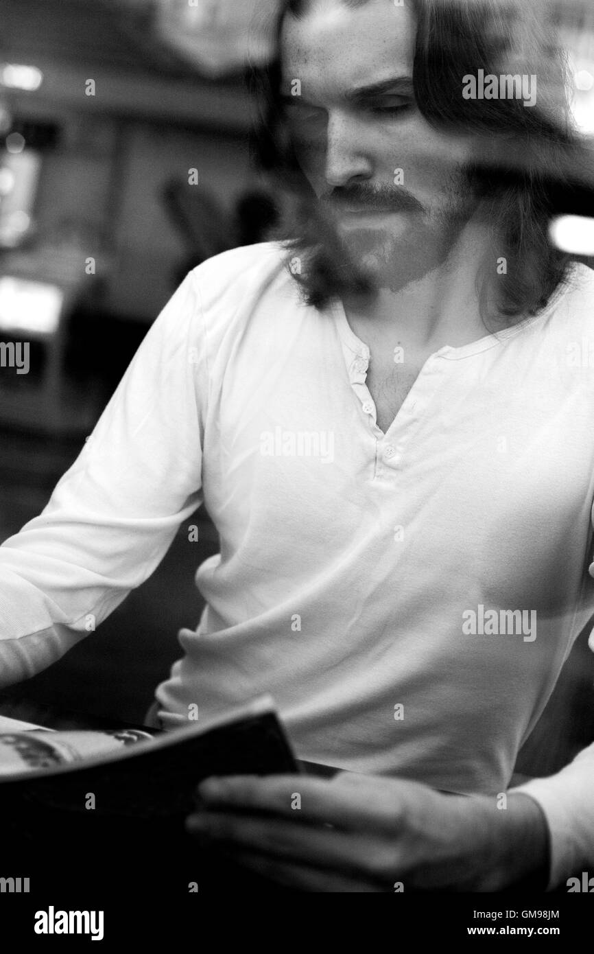 Window reading Black and White Stock Photos & Images - Alamy