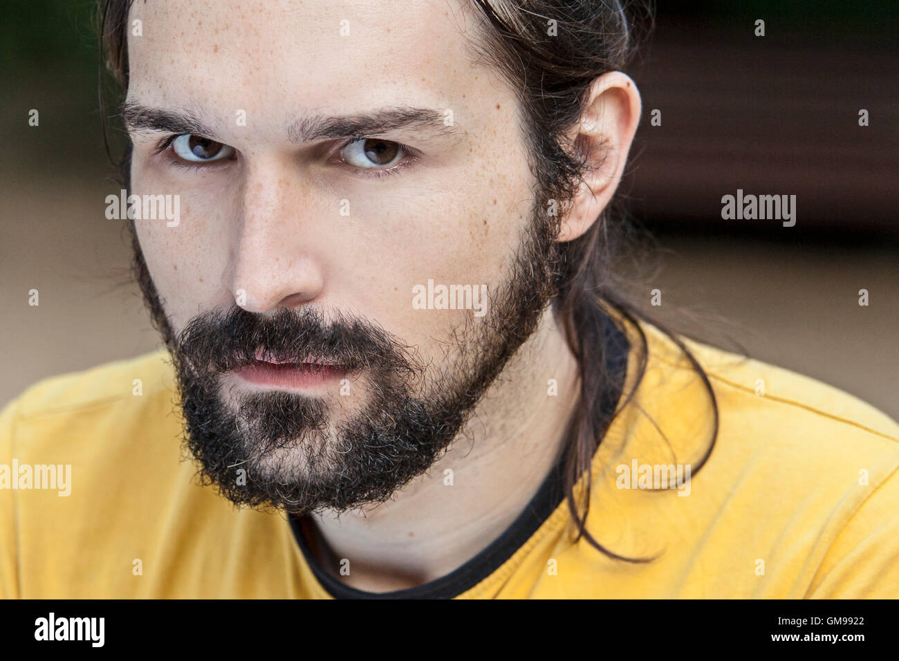 Portrait of young man with beard Stock Photo - Alamy