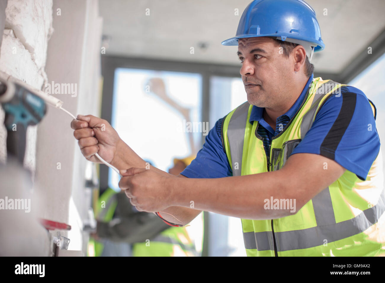Construction worker at work Stock Photo - Alamy
