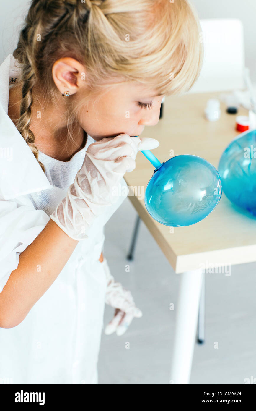 Child playing in chemical laboratory Stock Photo - Alamy